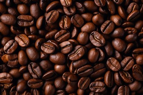 Premium Ai Image Zoomed Roasted Beans Texture As Background