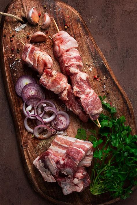 Raw Pork Meat On Wooden Sticks Pickled Kebab With Spices Top View