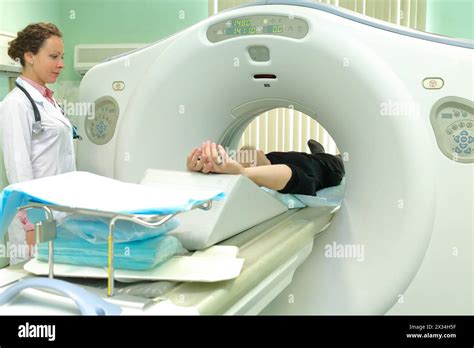Nurse And Patient Being Scanned And Diagnosed On Ct Computed