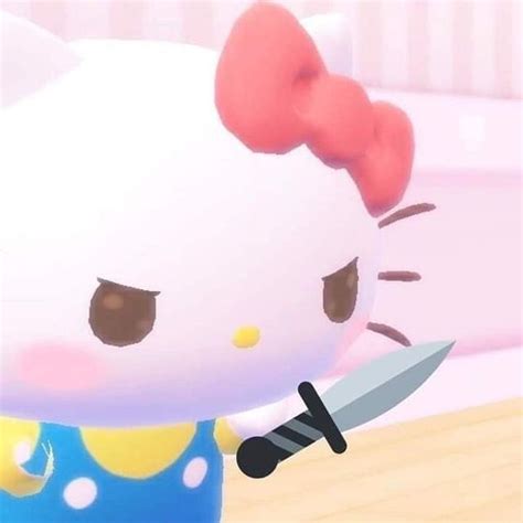 An Animated Hello Kitty Holding A Knife And Wearing A Polka Dot Shirt