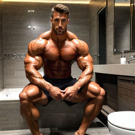Handsome Bodybuilder With Huge Muscles Veins In Hotel Bathro By Playground