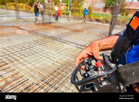 Operator Worker Is Holding Industrial Remote Wireless Console Control With Joystick To