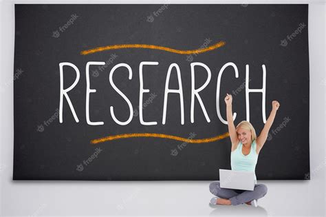 Premium Photo Cheering Blonde With Laptop Against The Word Research