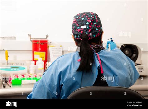Female Scientist Extracting Dna Using The Spin Column Based Nucleic