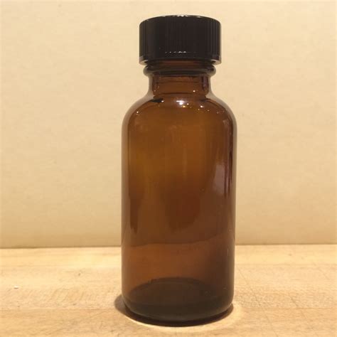 1 Oz Glass Amber Boston Round Bottle Wblack Lid Living Earth Herbs