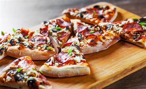 Pizza With Mozzarella Cheese Salami Pepper Pepperoni Olives Spices