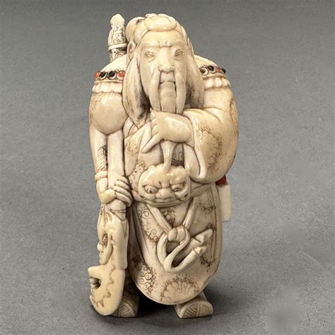 Lot 048 Carved Chinese Man In Costume Carrying Weapons With Colorful