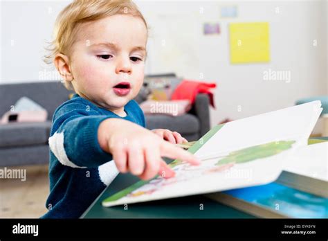 Babe Pointing At Book Stock Photo Alamy