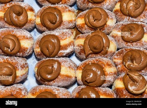 Many Donuts Placed In A Tray For Sale At Food Market Close Up Donuts