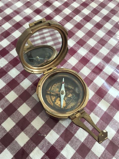 A Compass Which Also Has Angular Markings On It And A Bubble Level And