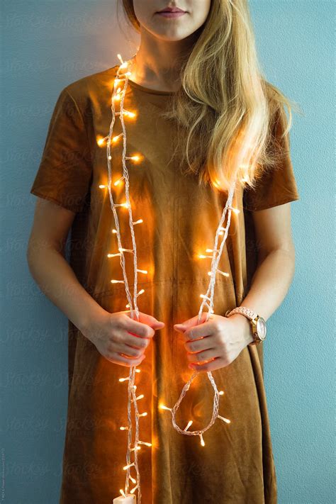 Girl Posing With Garland By Stocksy Contributor Danil Nevsky Stocksy