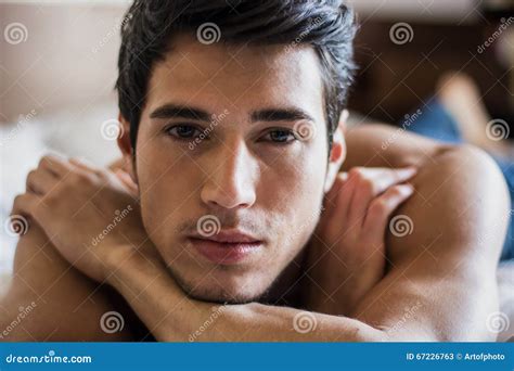 Shirtless Male Model Lying Alone On His Bed Stock Image Image Of