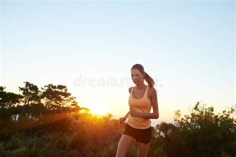 Make Every Run Your Run A Beautiful Brunette Training Outdoors Stock