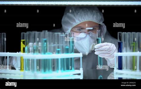 Female Scientist Studying Liquid In Test Tube In Laboratory Dangerous Experiment Stock Photo Alamy