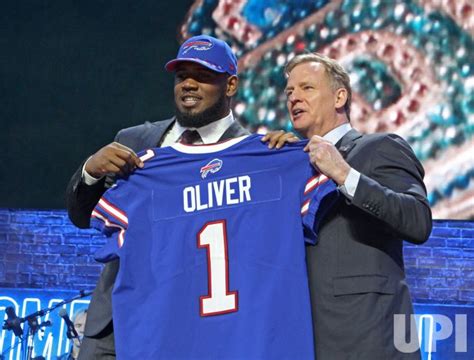 Photo Ed Oliver Eceives A Jersey From Nfl Commissioner Roger Goodell