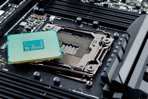 CPU Socket And Processor On The Motherboard Before Installation Stock Photo Image Of