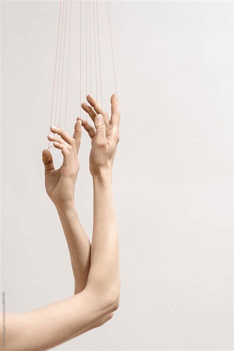 Woman S Hands With Red Threads Which Symbolized Control And