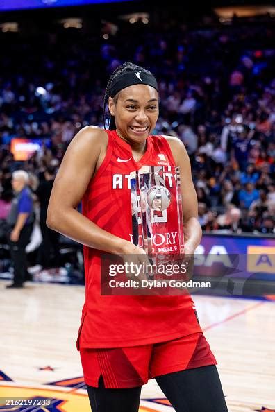 Allisha Gray Of The Atlanta Dream Holds Her Trophy After The Starry