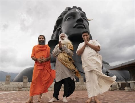 Sadhguru Jaggi Vasudev Takes Baba Ramdev For A Ride At Isha Centre In Coimbatore Photos
