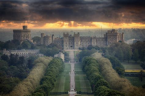 Download Windsor Castle Beneath Orange Sunset Sky Wallpaper