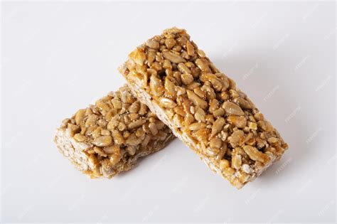 Premium Photo Kozinak From Sunflower Seeds On A White Background Traditional Georgian Sweetness