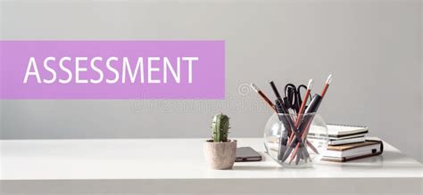 Assessment â€“ Text On The Background Of The Office Table Business
