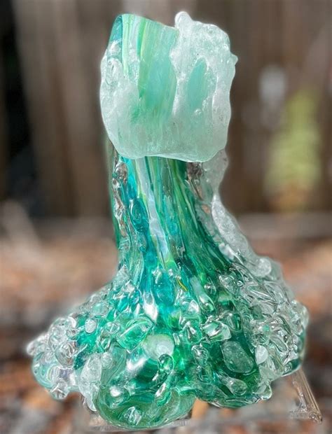 Glass Wave Sculpture Greens Maui Hands