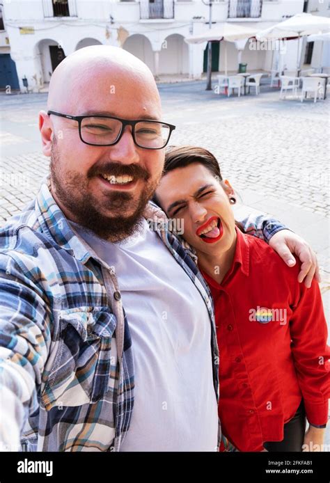 A Transgender Non Binary Girl With A Friend Taking A Selfie