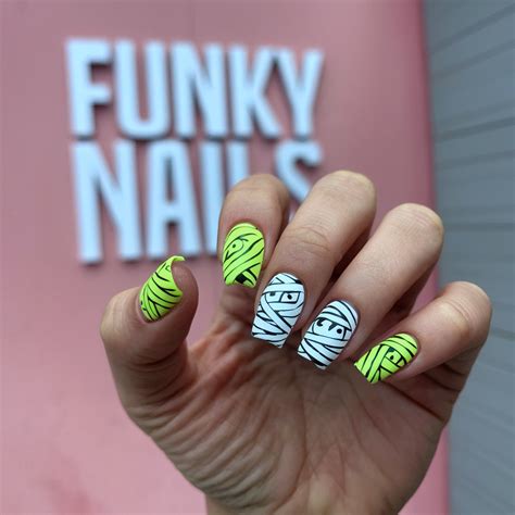 10 Spooky Cool Mummy Nail Designs For A Hauntingly Chic Look Mycozyspace