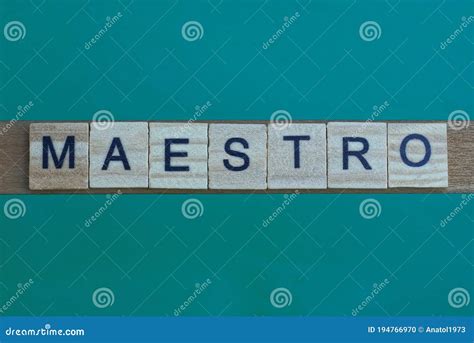 Palavra Cinzenta Maestro Feito De Letras Quadradas De Madeira Foto De
