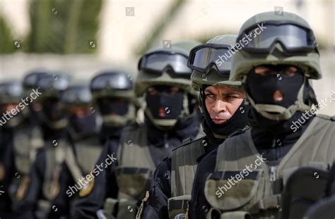 Masked Palestinian National Security Soldiers Take Editorial Stock