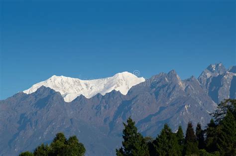 Beautiful First Light From Sunrise On Snow Peak Of Mount Kabru Part Of