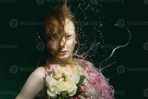 Young Redhead Girl In Dress Made Of Roses Underwater 11080713 Stock