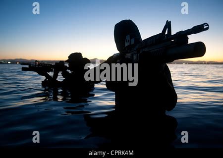 Us Navy Seals During Water Training At Sunrise October 21 2009 In