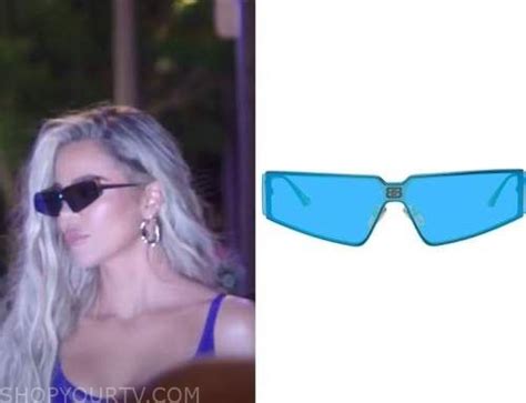 A Woman Wearing Blue Sunglasses Next To An Image Of The Same Person In