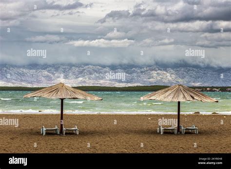 Nin Croatia Two Reed Sunshades At The Empty Queens Beach By The Mediterranean Town Of Nin At