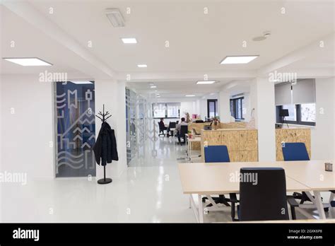Empty Startup Business Office Interior With Modern Computers And