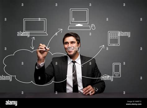 Businessman With Cloud Computing And Connectivity Concept Stock Photo