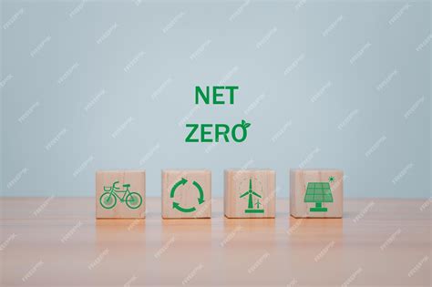 Premium Photo Wooden Cubes With Green Net Zero Icon And Green Icon On