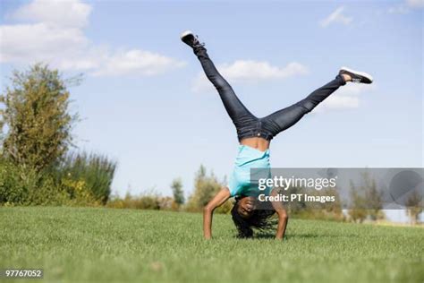 Girl Doing Handstand Photos And Premium High Res Pictures Getty Images