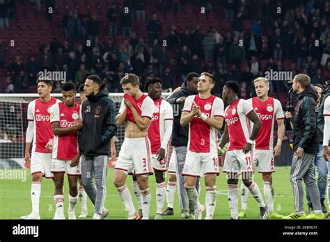 The Players Of Amsterdam Celebrate After Winning The Eredivisie Match