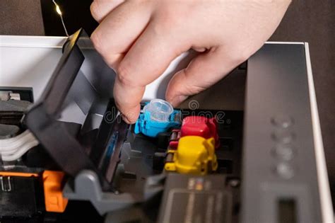 Securing Blue Ink Tank In Printer During Maintenance Process For