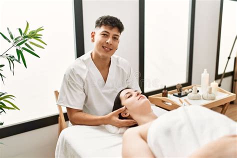 Young Woman Reciving Relaxing Massage At Beauty Center Stock Image