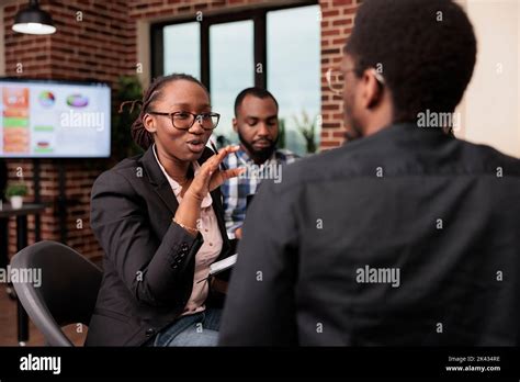 Startup Colleagues Planning Business Presentation With Data Research