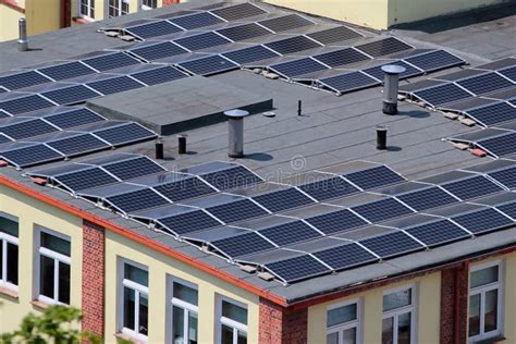 Solar Panels On A Flat Roof Of A Building Stock Image Image Of Living