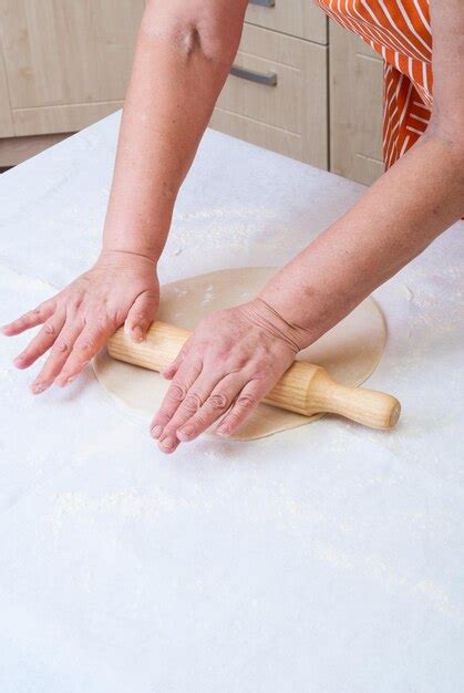 Premium Photo Woman Hands Knead Dough Cooking Pizza