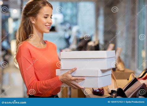 Woman Or Shop Assistant With Shoe Boxes At Store Stock Image Image Of
