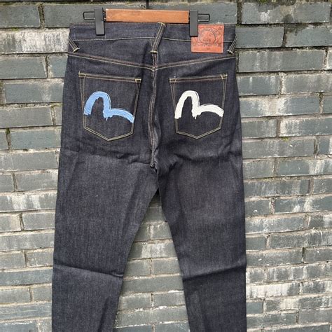 Evisu กางเกงยีนส์ผู้ชายทรงตรงรุ่นใหม่ Jacquard หลวมปักซิปกางเกงยีนส์ Buvx Shopee Thailand