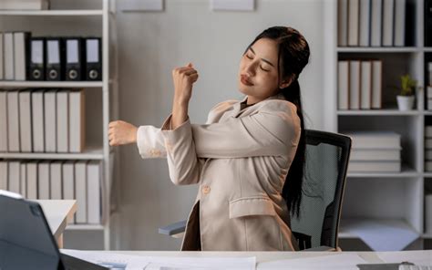 10 Exercises You Can Do At Your Desk For Better Strength And Mobility