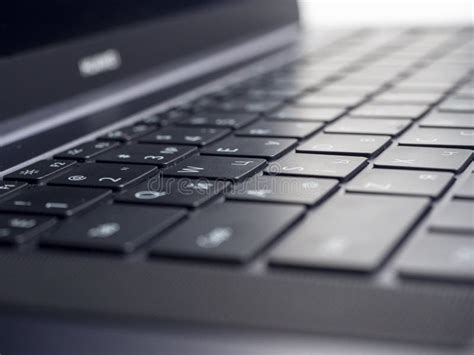 Close Up Of The Keyboard Of An Open Laptop Selective Focus Stock Photo